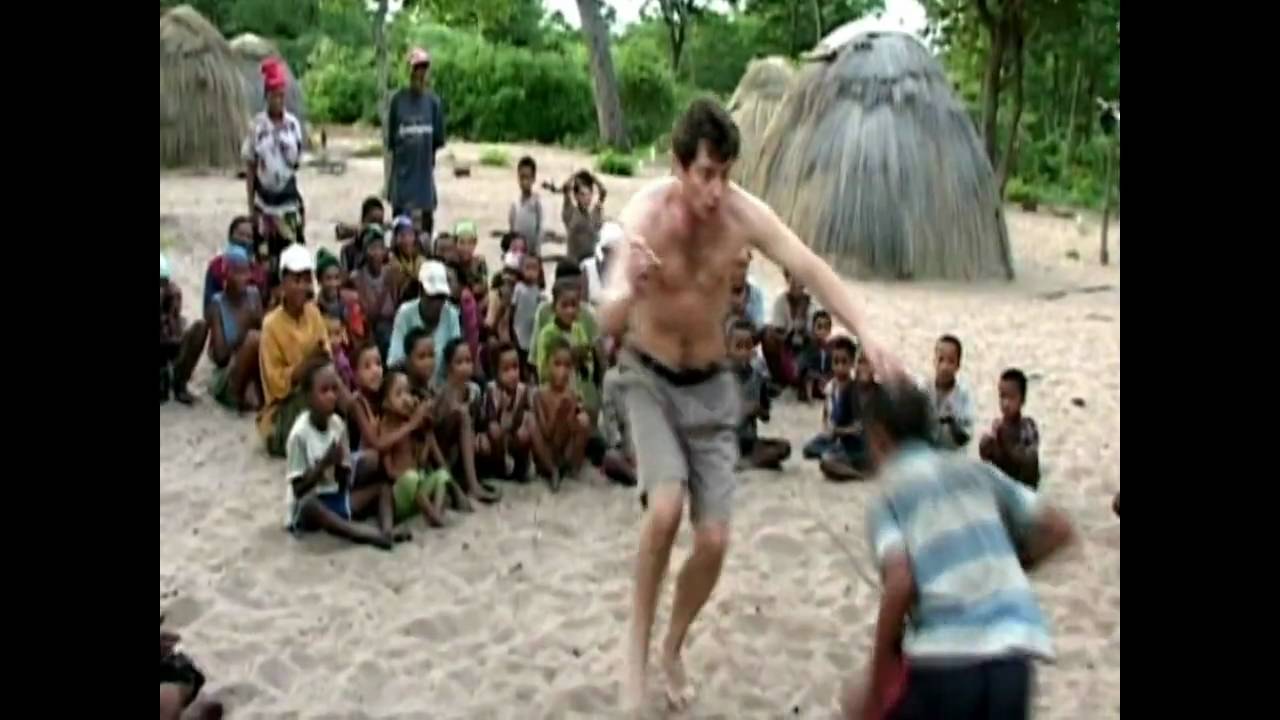 Eric Bouvron Entertains the Bushmen Children in Africa
